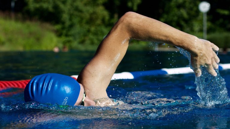 Swim fitness fins on legs. Great new exercise - shinfin™ leg fins
